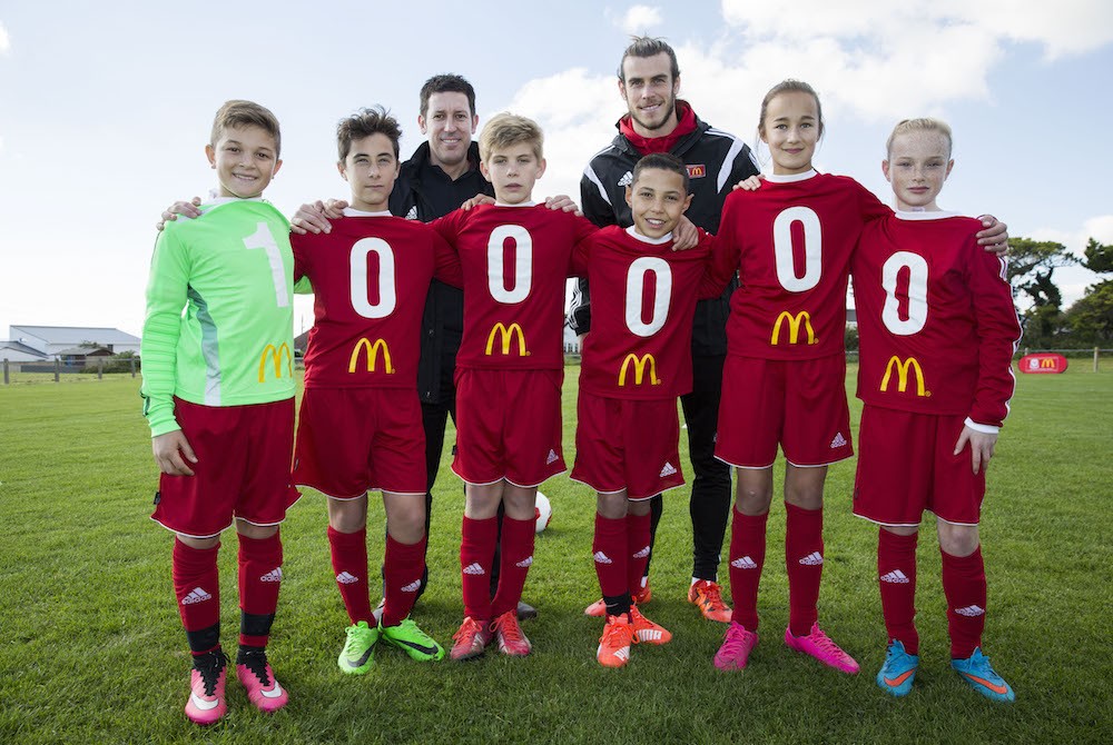 Bale delivers 100,000th McDonald's kit - Sports Industry Group